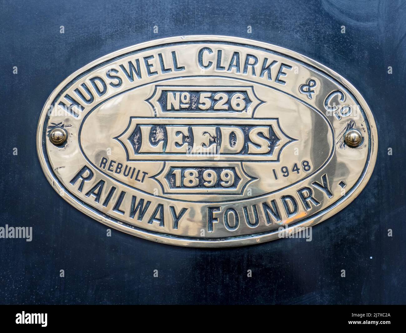 A brass plaque on a steam engine at Penrhyn Castle, Bangor, North Wales ...