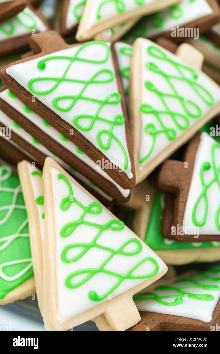 Gingerbread cookies decorated with white royal icing Stock Photo - Alamy
