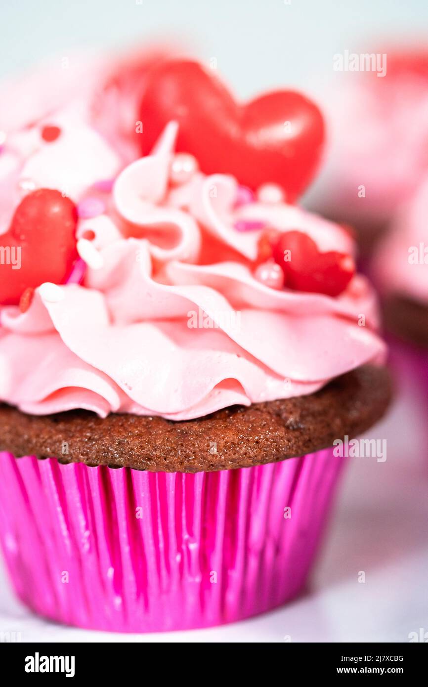 Red velvet cupcakes with pink Italian buttercream frosting and ...