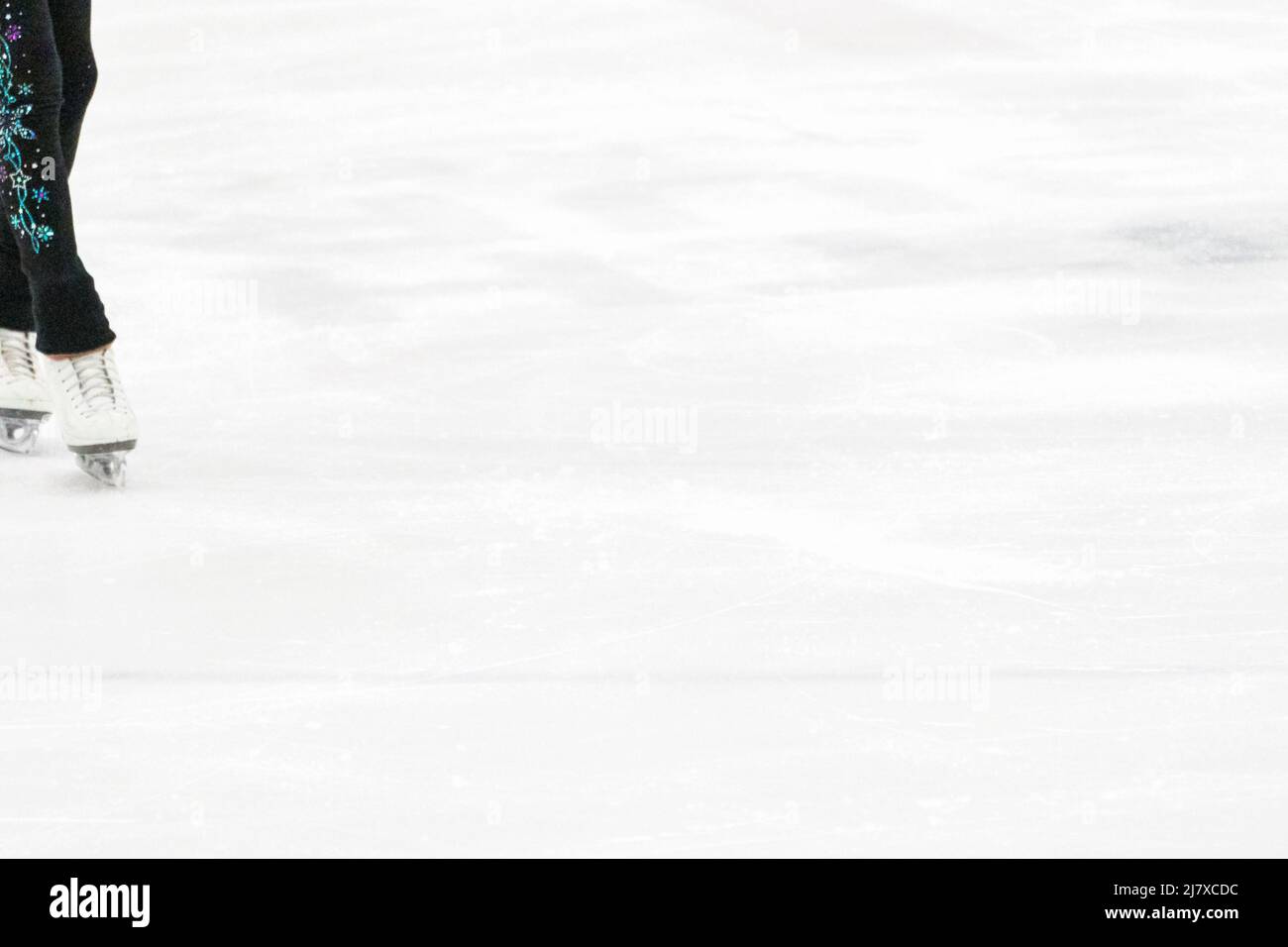 View of figure skater feet at the figure skating practice Stock Photo ...