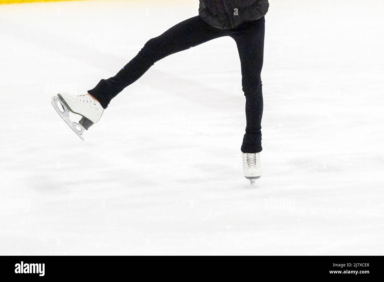 View of figure skater feet at the figure skating practice Stock Photo ...