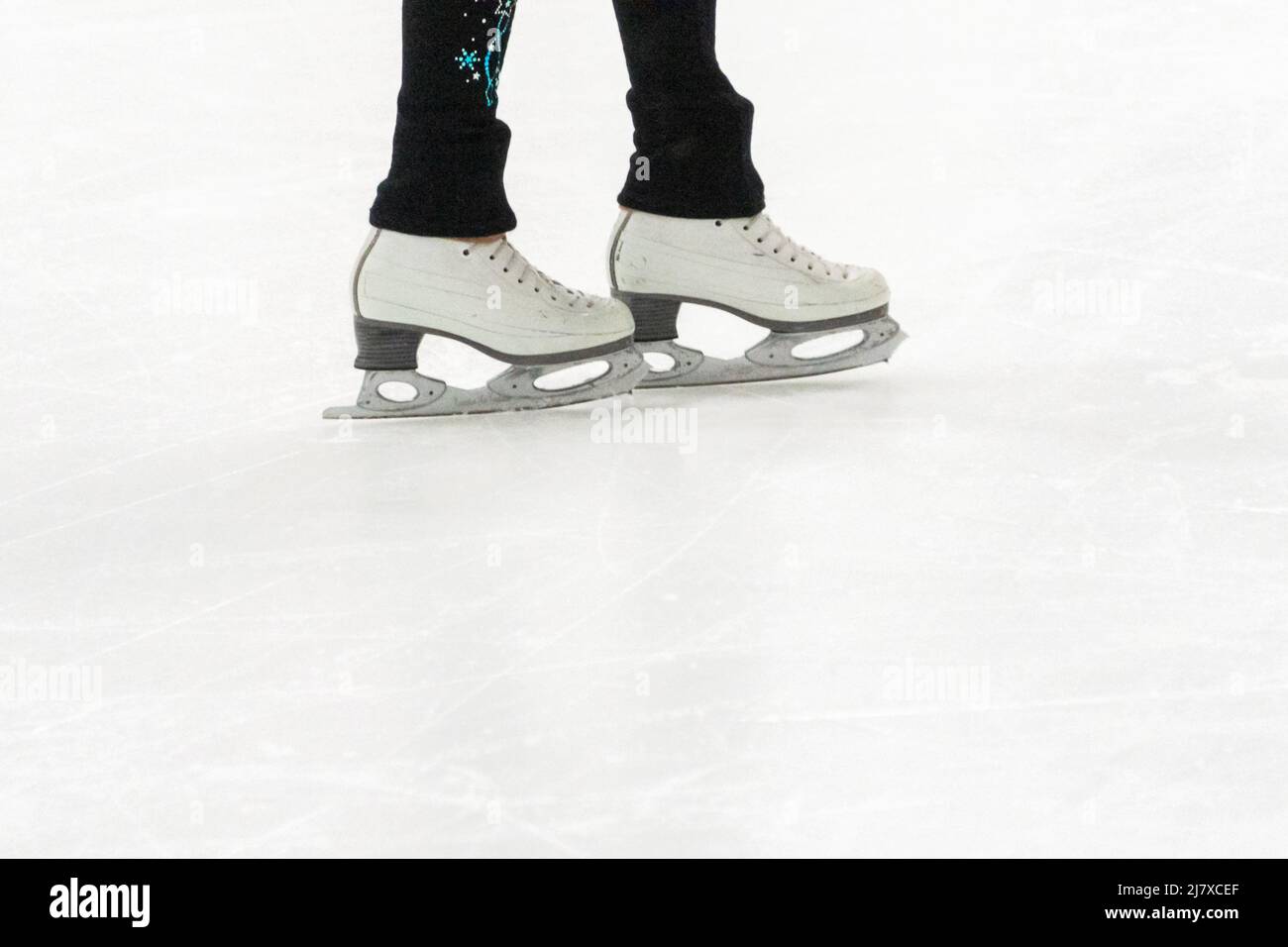 View of figure skater feet at the figure skating practice Stock Photo ...