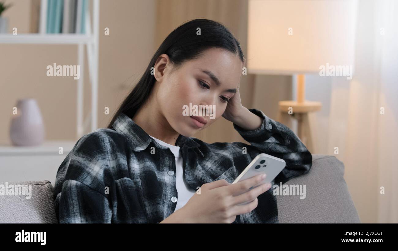 Asian woman has money problem online transfer payment error blocked ...