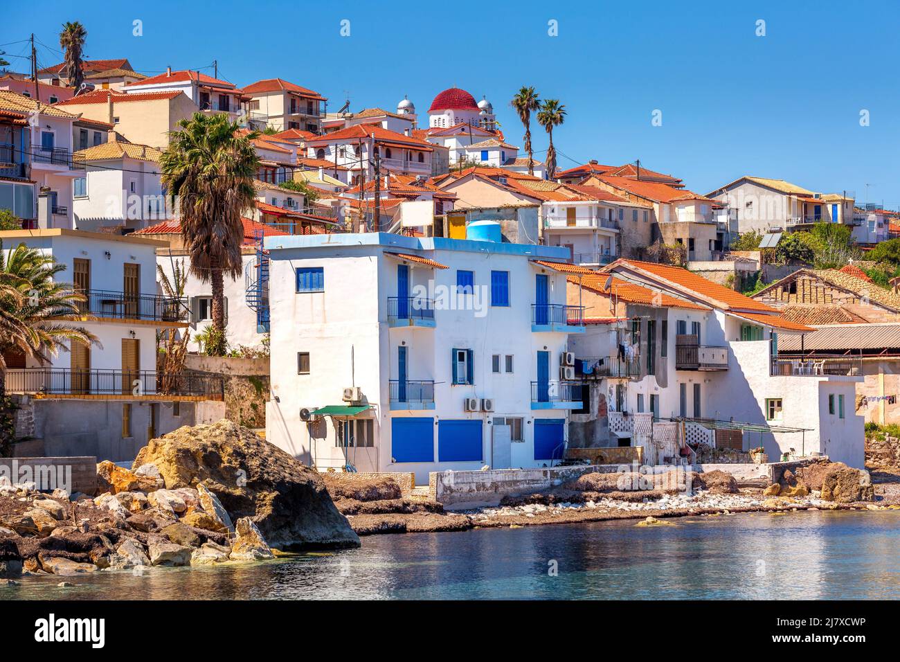 View of traditional fishing village of Koroni, Greece and coastline ...