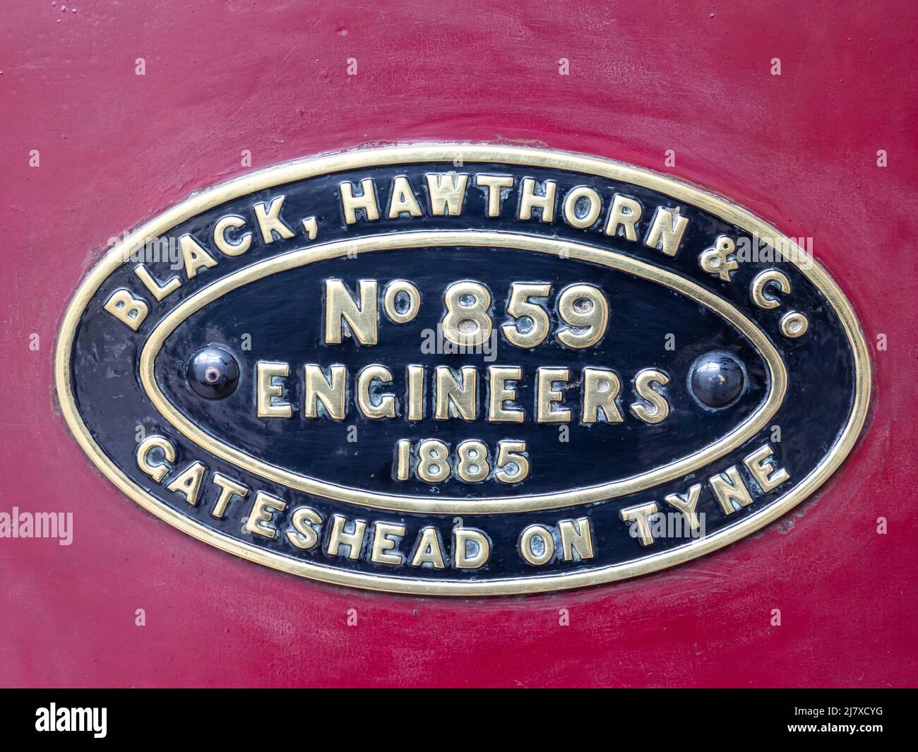 A brass plaque on a steam engine at Penrhyn Castle, Bangor, North Wales ...