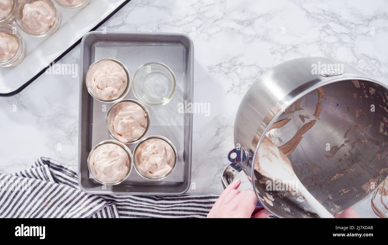 Flat lay. Step by step. Scooping homemade chocolate ice cream into ...