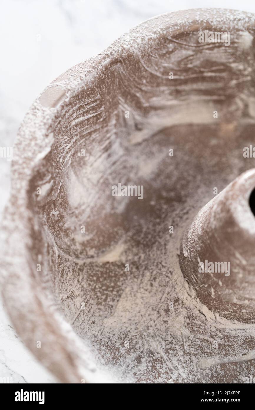 Greasing metal bundt cake hi-res stock photography and images - Alamy