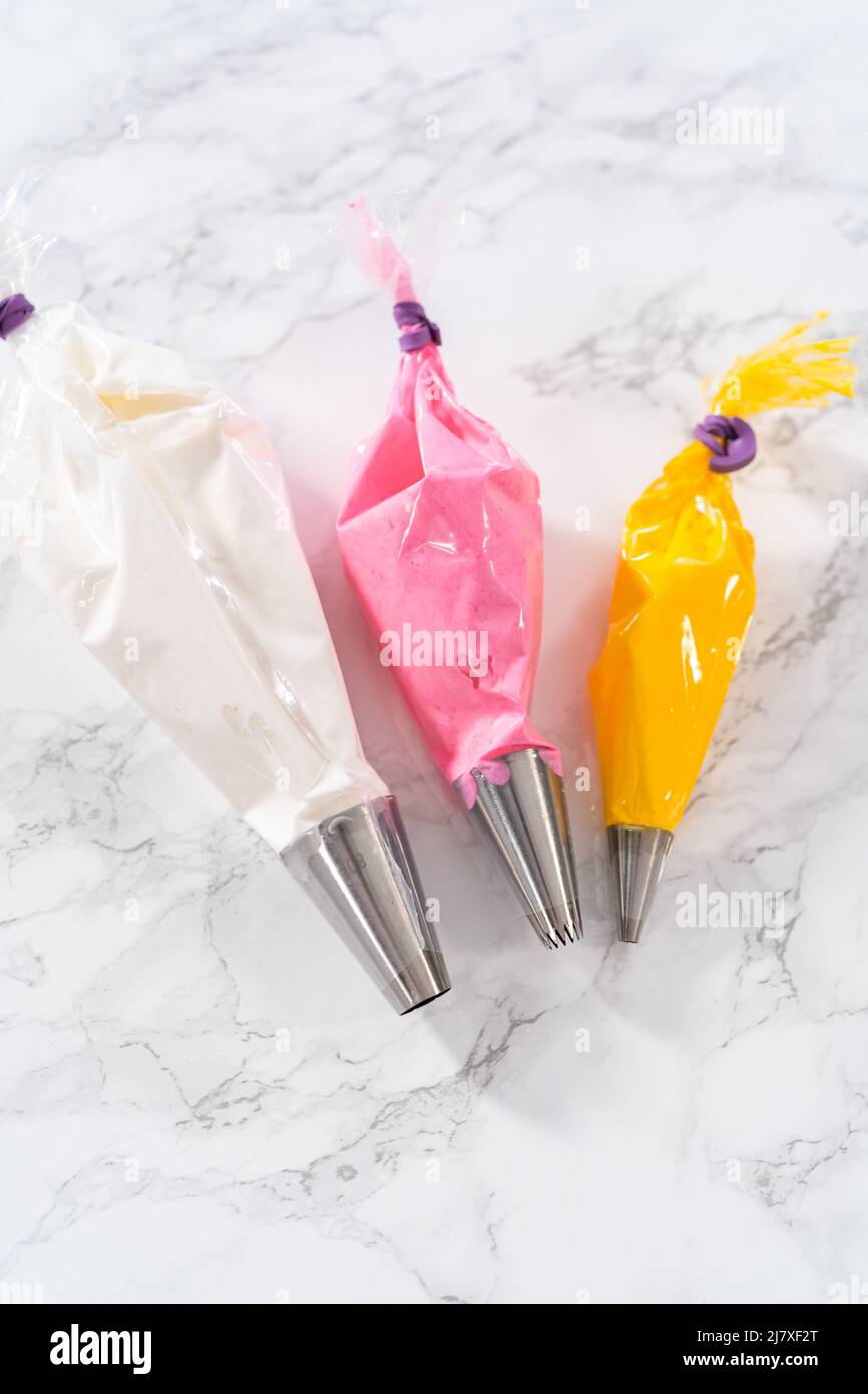 Meringue in piping bags with metal piping tips to pipe Easter meringue ...