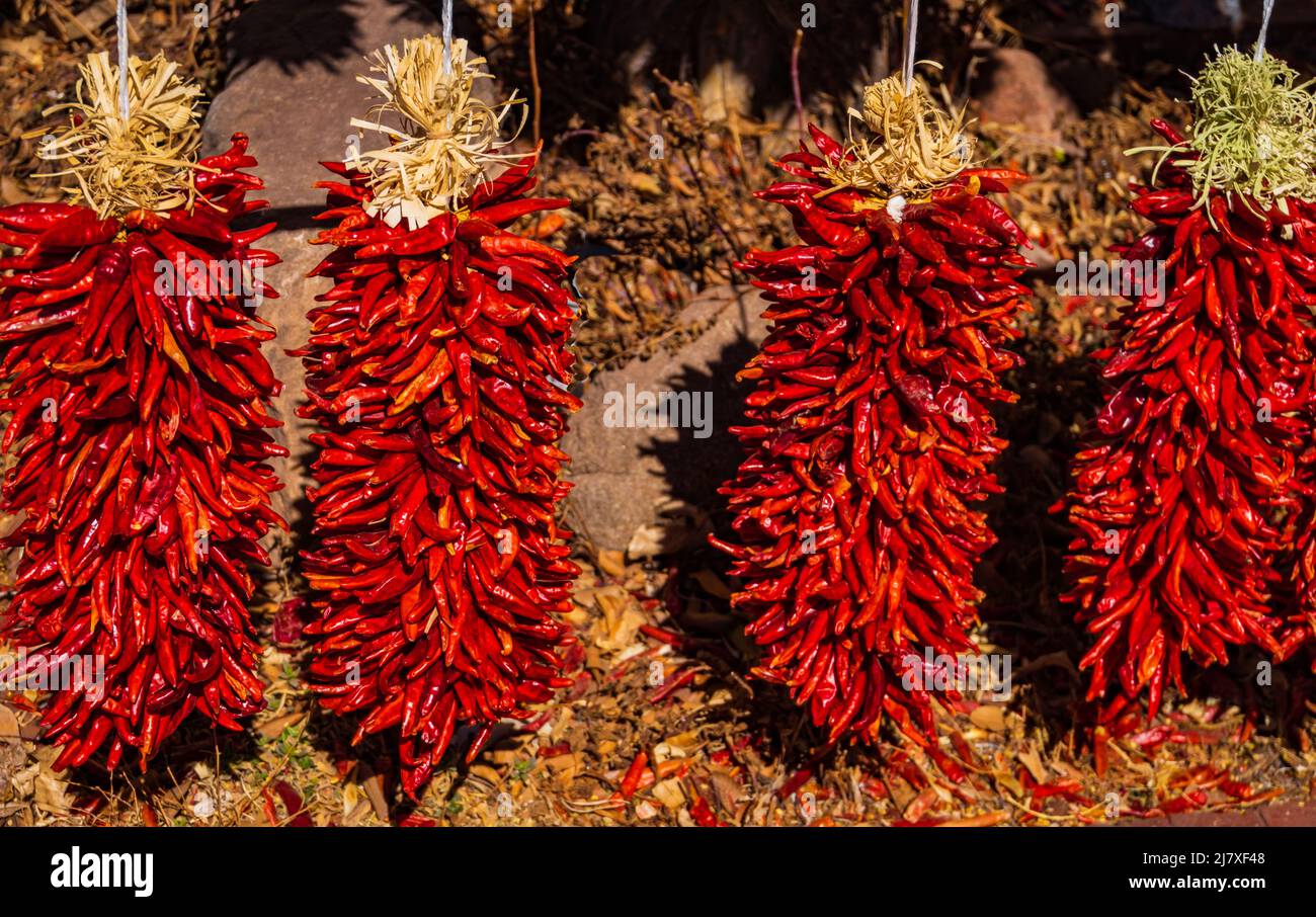 red pepper ristras on display for sale Stock Photo - Alamy