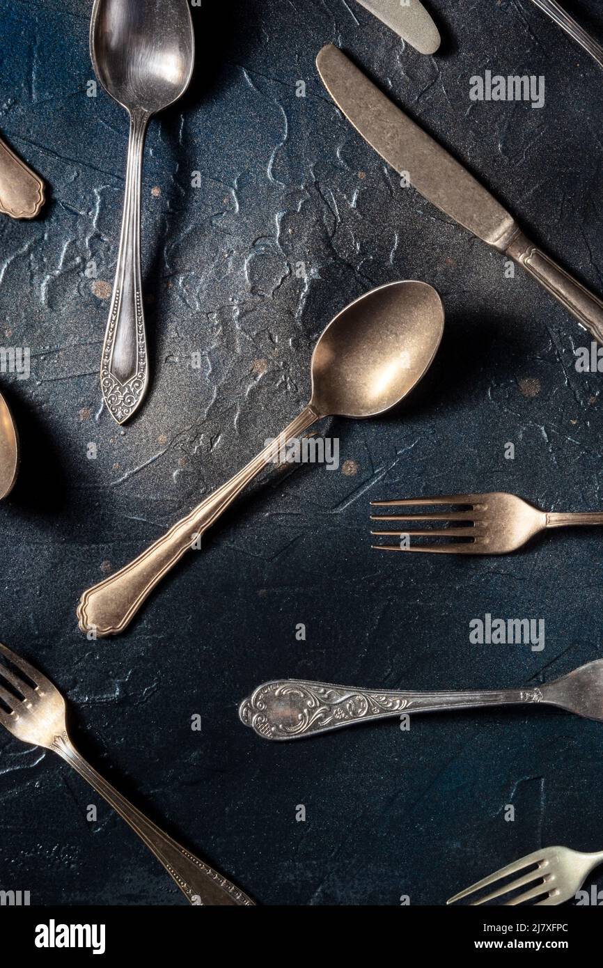 Cutlery flat lay. Spoons, forks, and knives, various table utensils ...