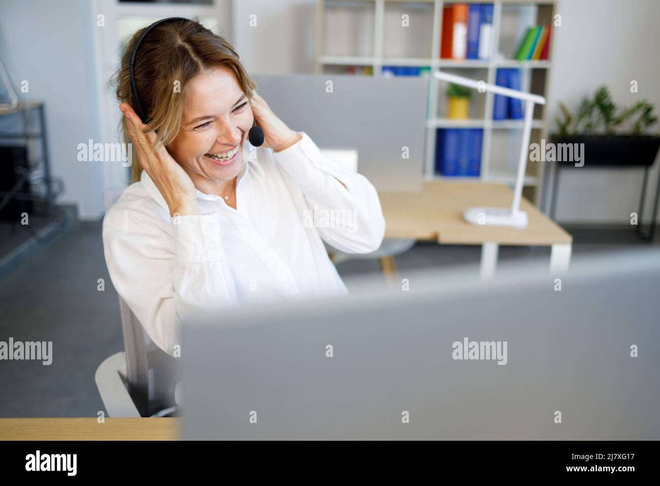Laughing call center hi-res stock photography and images - Alamy