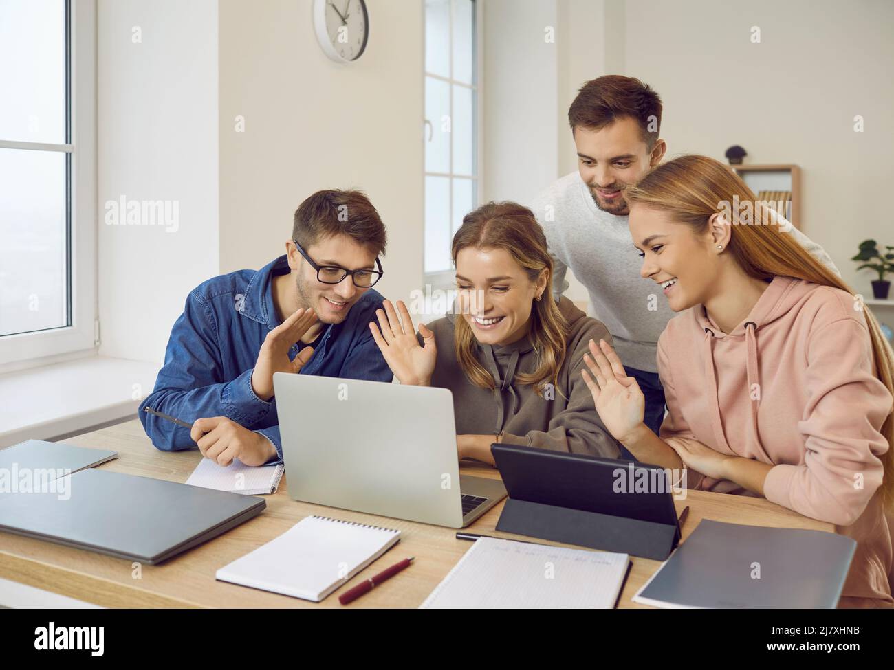 Smiling young people have webcam computer call Stock Photo - Alamy