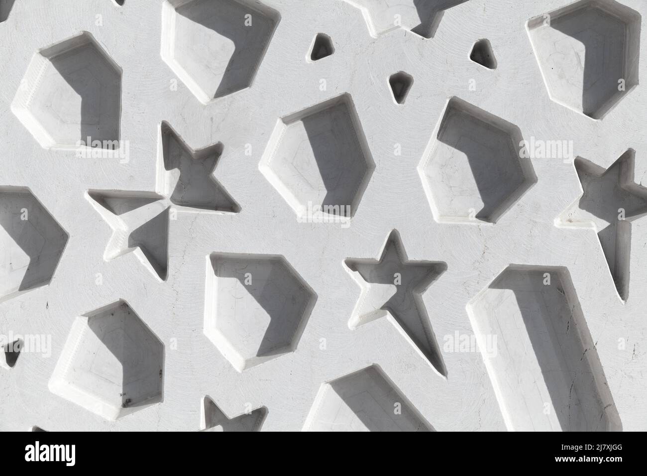 Abstract white Arabic pattern, close up background texture. Mosque wall ...