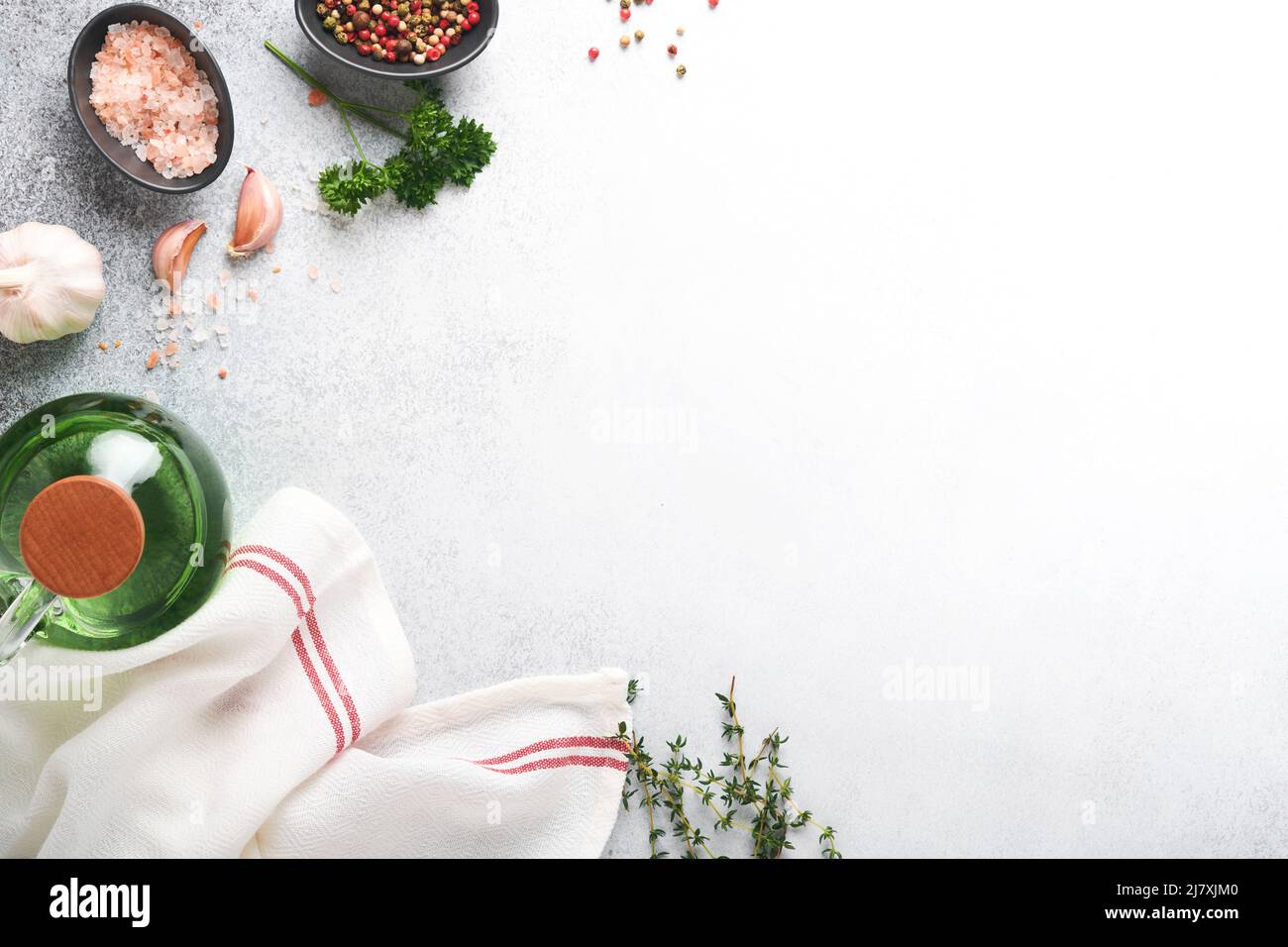 Food cooking background. Stone texture with sea salt, pepper garlic and ...