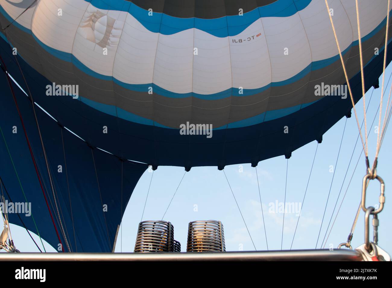 Gas burn in Hot air balloon against the blue sky Stock Photo - Alamy