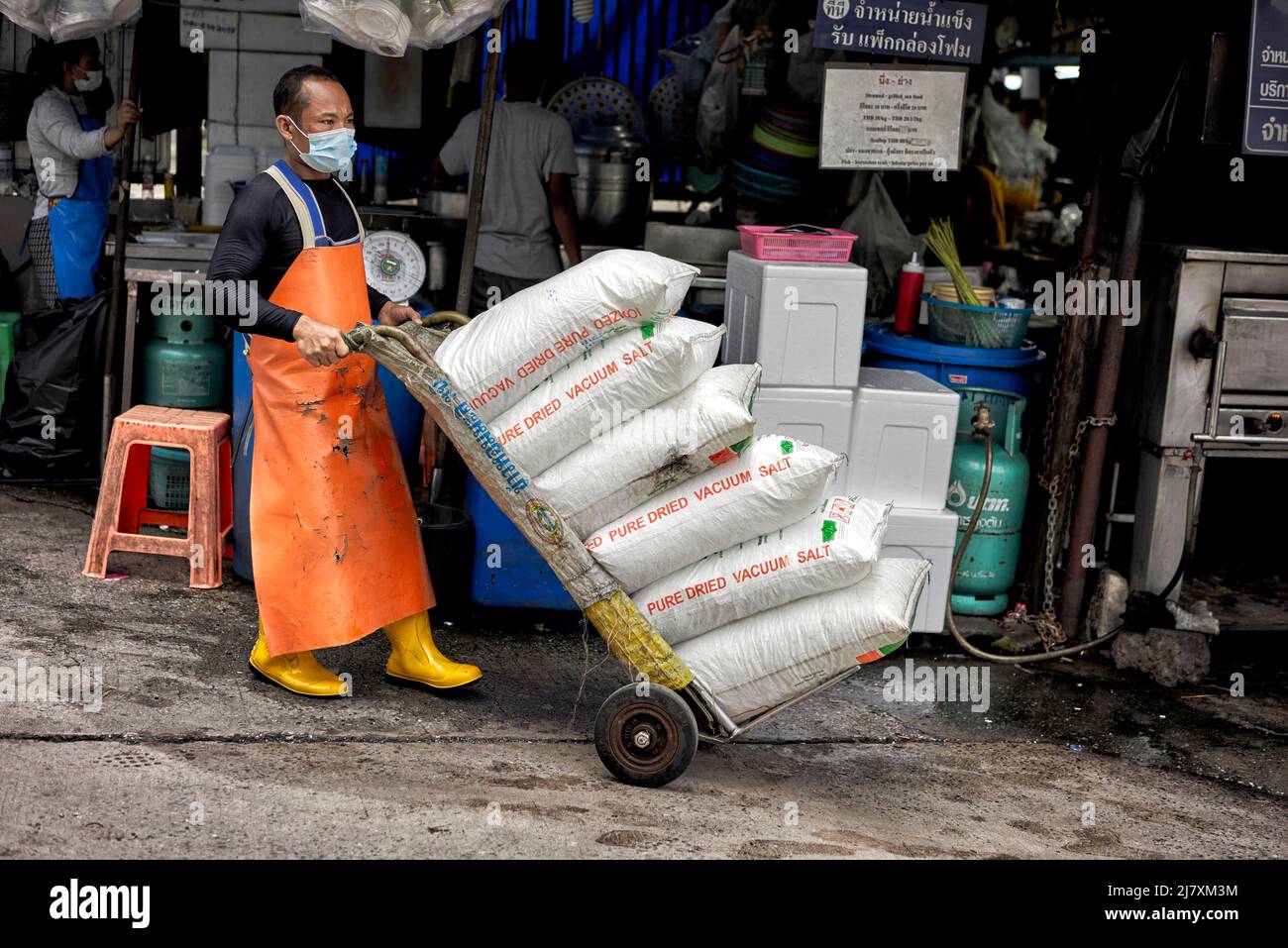Market porter delivering load with a hand cart, Thailand, Southeast Asia Stock Photo - Alamy
