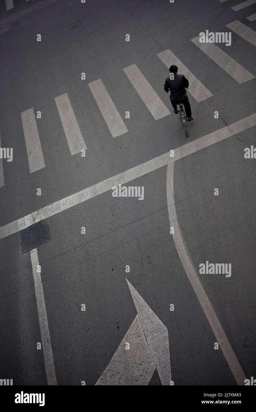 A bike on road crossing zebra line Stock Photo - Alamy