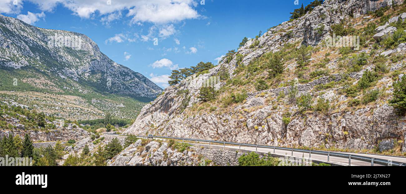 Scenic road. Road is surrounded by a magnificent natural landscape ...