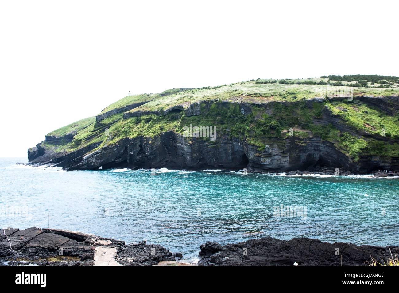 The beautiful beach and cliff Stock Photo - Alamy
