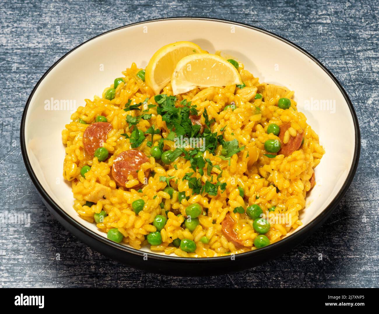 chorizo & pea risotto Stock Photo - Alamy