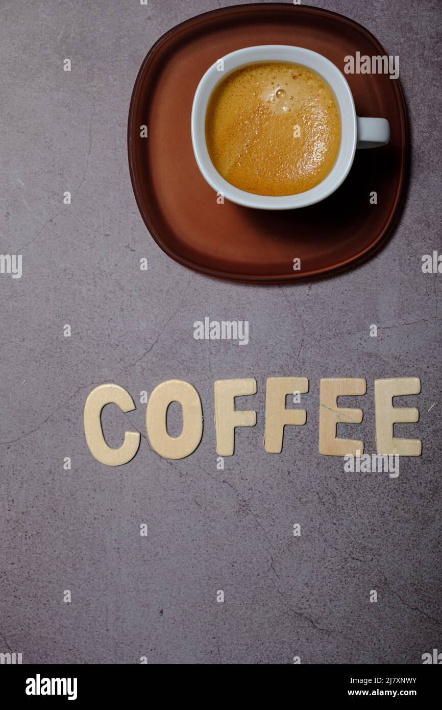 Espresso coffee text word with coffee served on a white cup on a ...