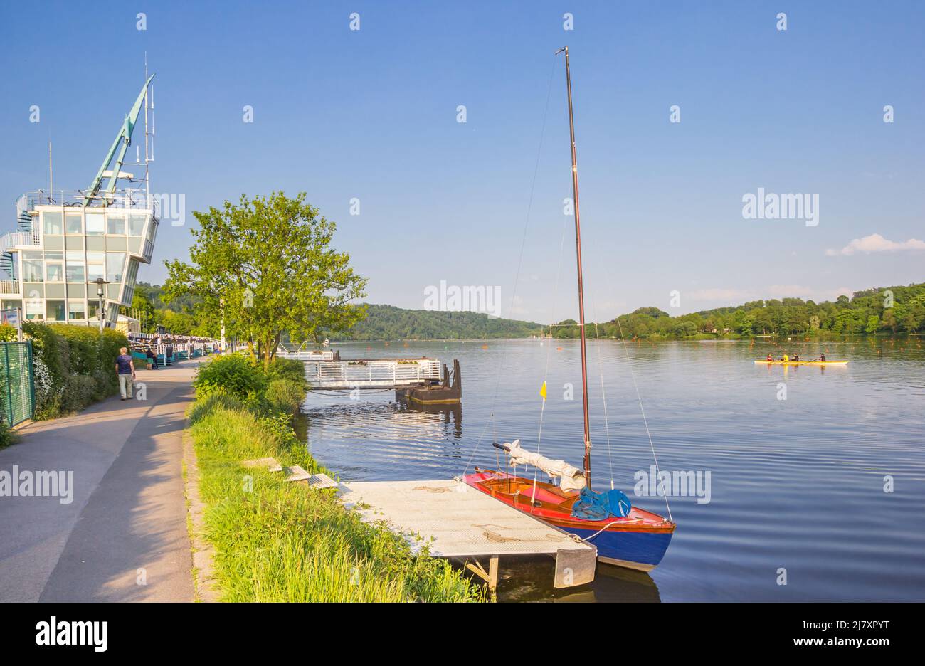 Walking path at the lake side of the Baldeney lake in Essen, Germany ...
