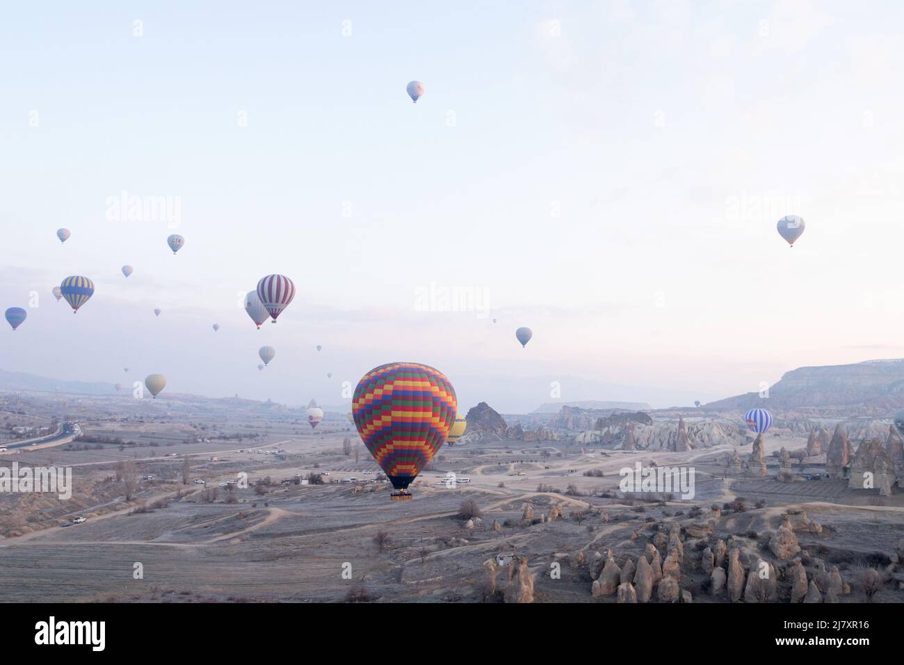 Hot Air Balloons at sunrise in Cappadocia valley, Turkey Stock Photo ...