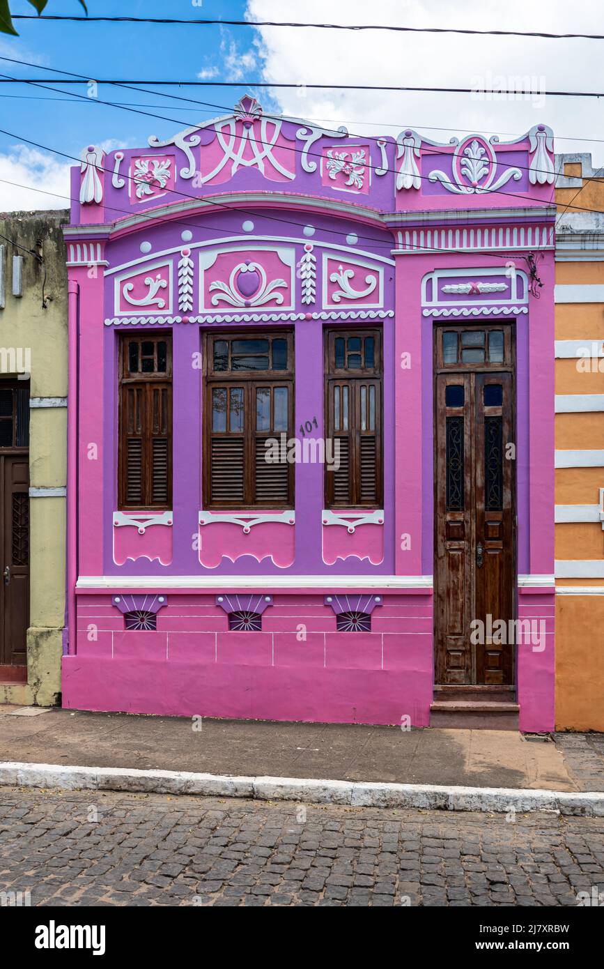 Pink front facade of old traditional house in Brazil Stock Photo - Alamy