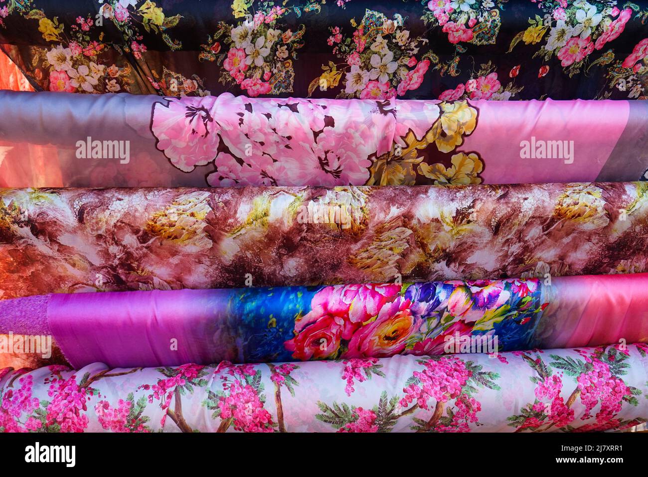 Colorful fabric rolls at a Vietnamese fabric market Stock Photo - Alamy