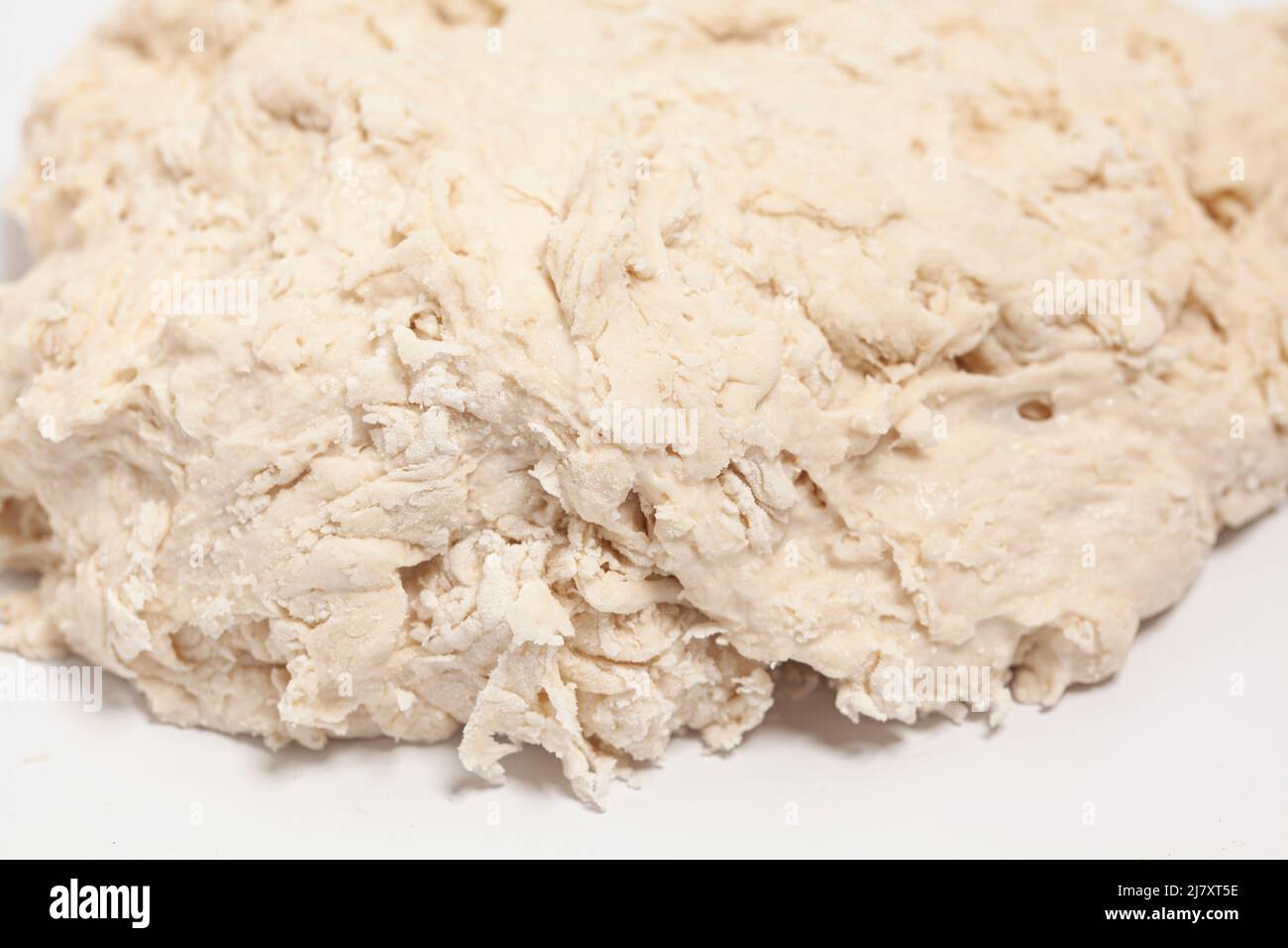Fresh dough isolated on white background Stock Photo - Alamy