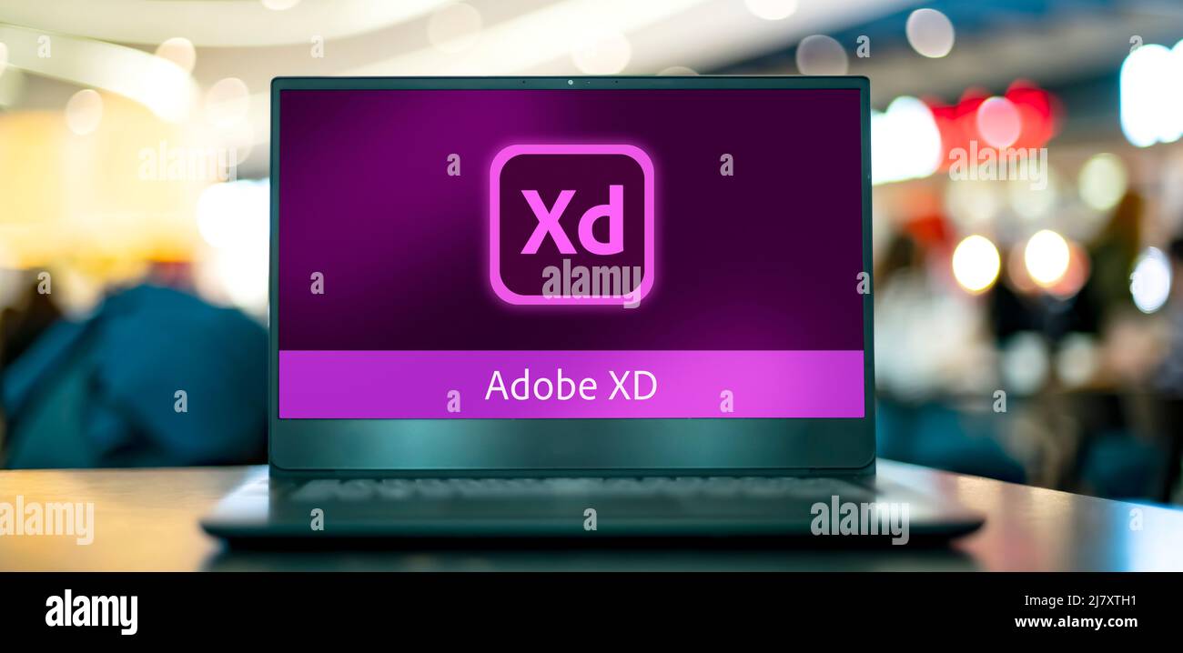 POZNAN, POL - JAN 16, 2022: Laptop computer displaying logo of Adobe XD ...