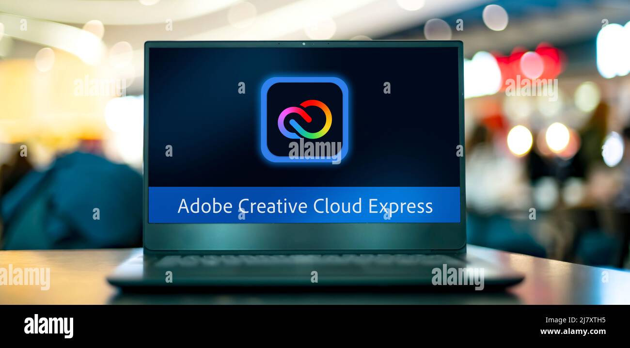 POZNAN, POL - JAN 16, 2022: Laptop computer displaying logo of Adobe Creative Cloud Express, a ...