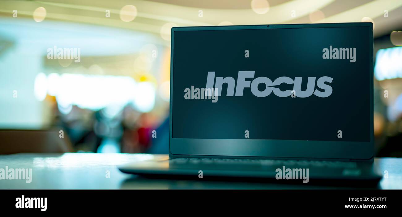 POZNAN, POL - APR 7, 2022: Laptop computer displaying logo of InFocus ...