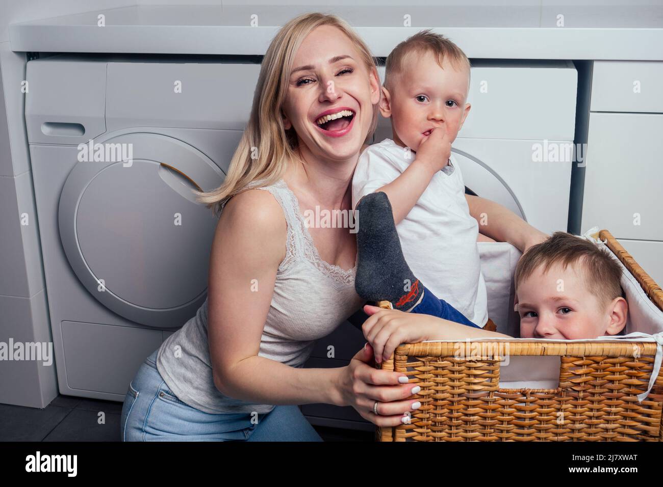 Mother washing adult son hi-res stock photography and images - Alamy