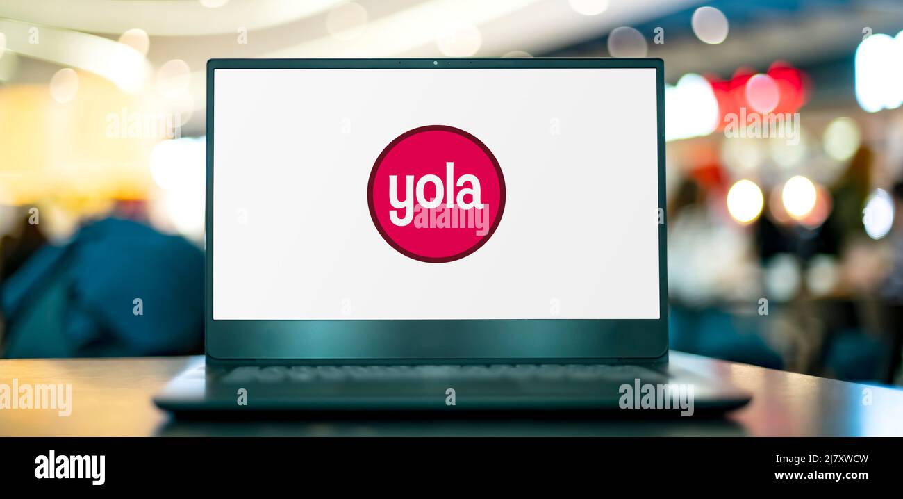 POZNAN, POL - FEB 25, 2022: Laptop computer displaying logo of Yola, a ...