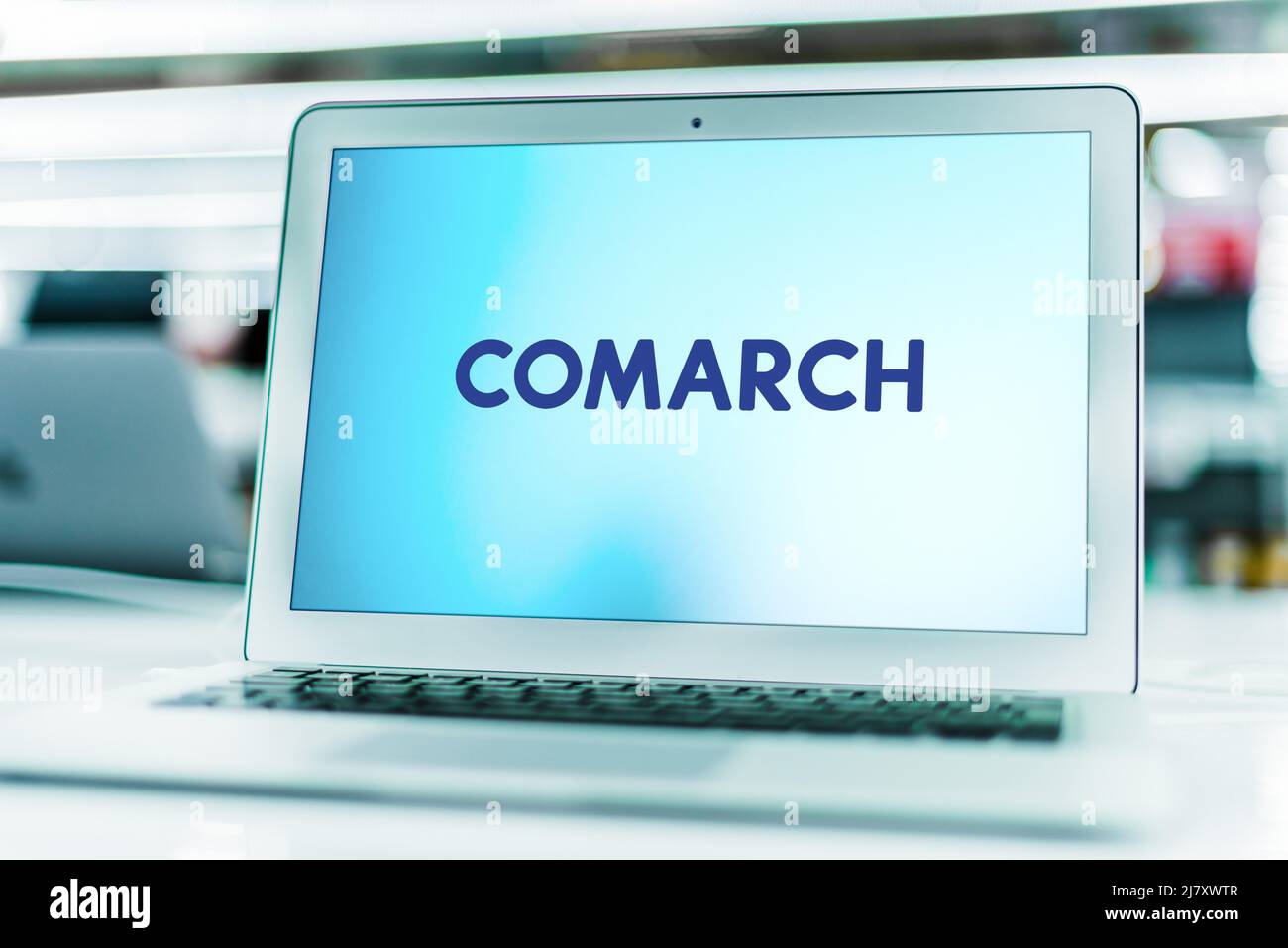 POZNAN, POL - DEC 8, 2021: Laptop computer displaying logo of Comarch ...