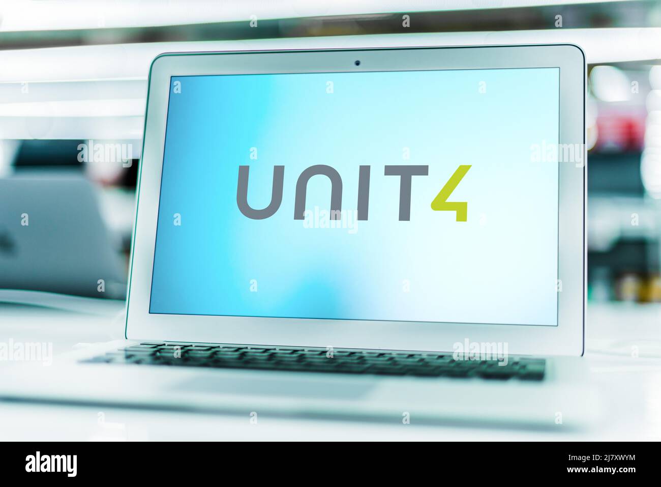 POZNAN, POL - DEC 8, 2021: Laptop computer displaying logo of Unit4, a software company that ...