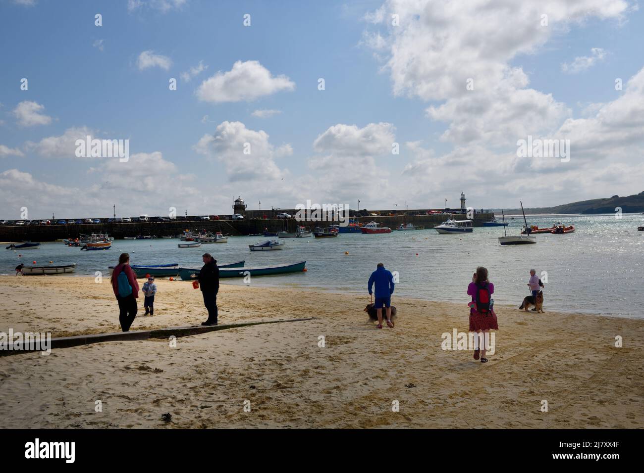 Holiday Makers enjoying themselves on Sandy Beach St Ives Cornwall ...