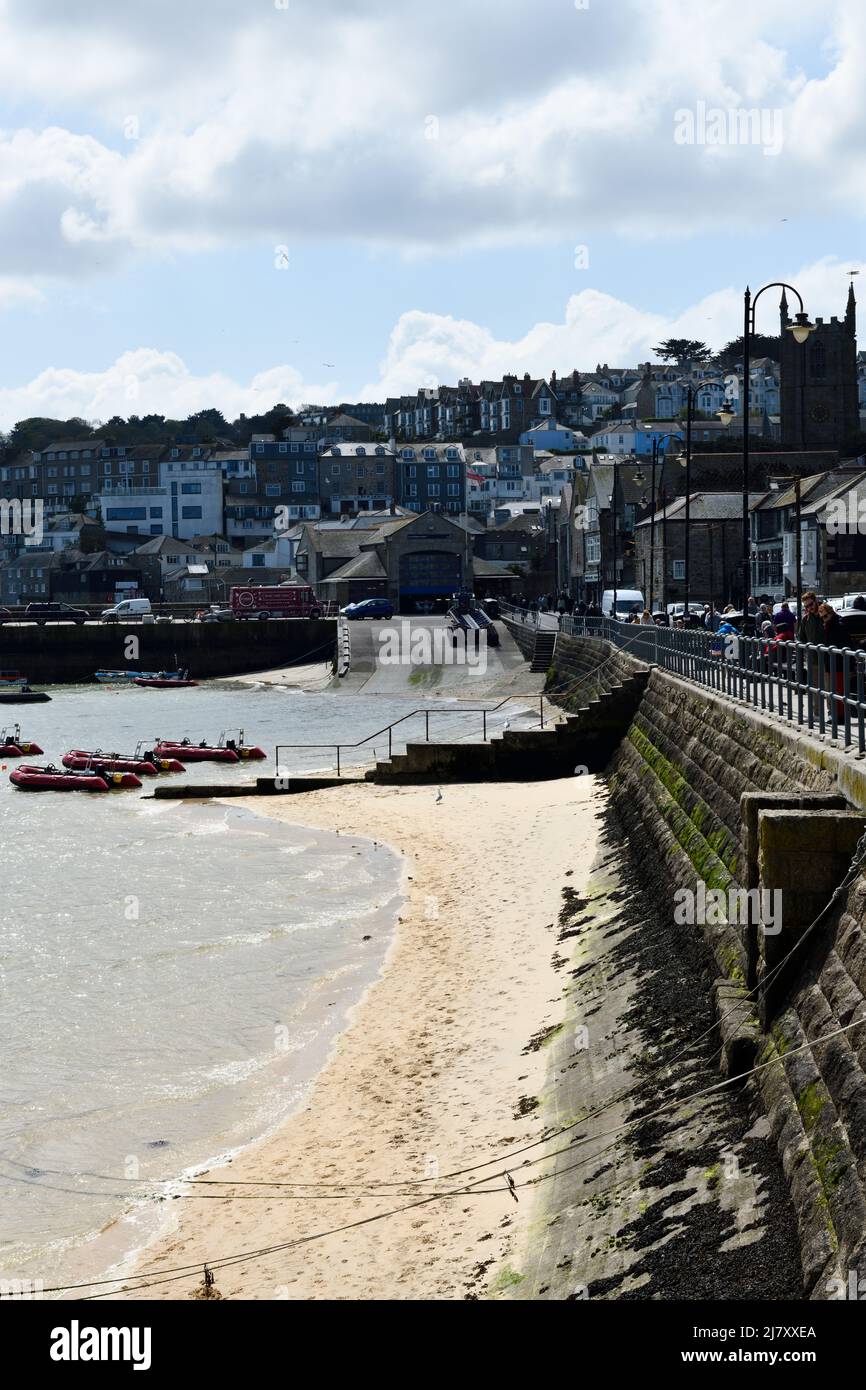 St Ives Harbour Wall with Tourists Cornwall England uk Stock Photo - Alamy