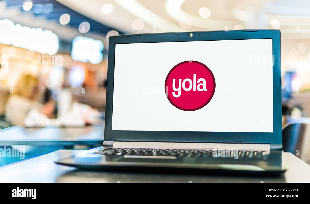 POZNAN, POL - FEB 25, 2022: Laptop computer displaying logo of Yola, a ...