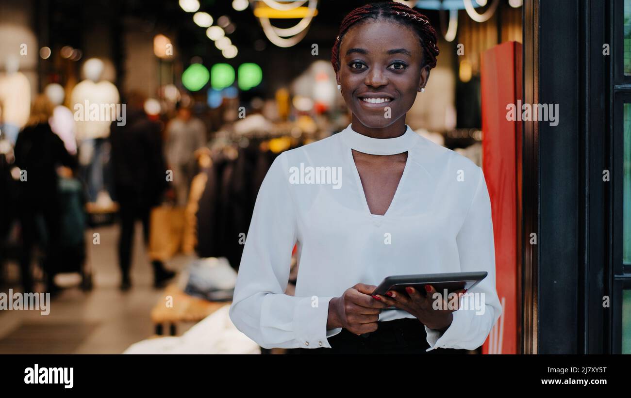 Portrait African american happy smiling glad successful salesperson ...