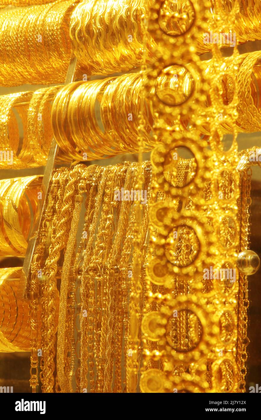 gold in jewelery shop window Stock Photo - Alamy