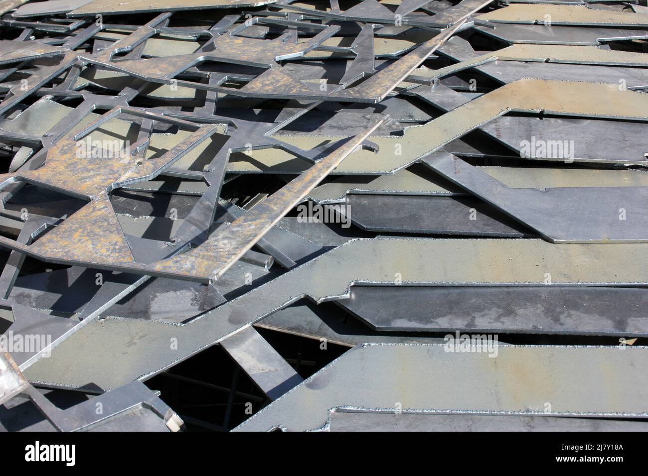 Scrap metal. metal residues after laser cutting Stock Photo - Alamy