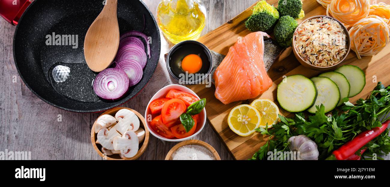 Fresh food ingredients prepared for cooking on a kitchen table Stock ...