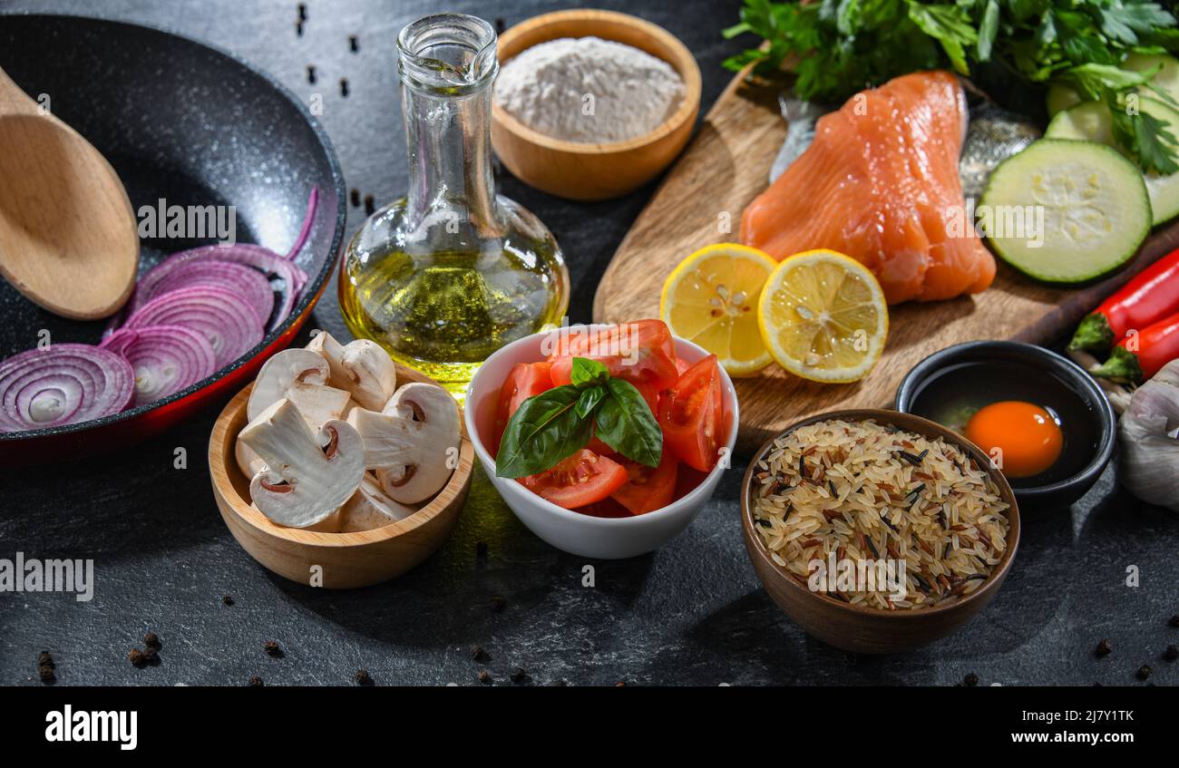 Fresh food ingredients prepared for cooking on a kitchen table Stock ...