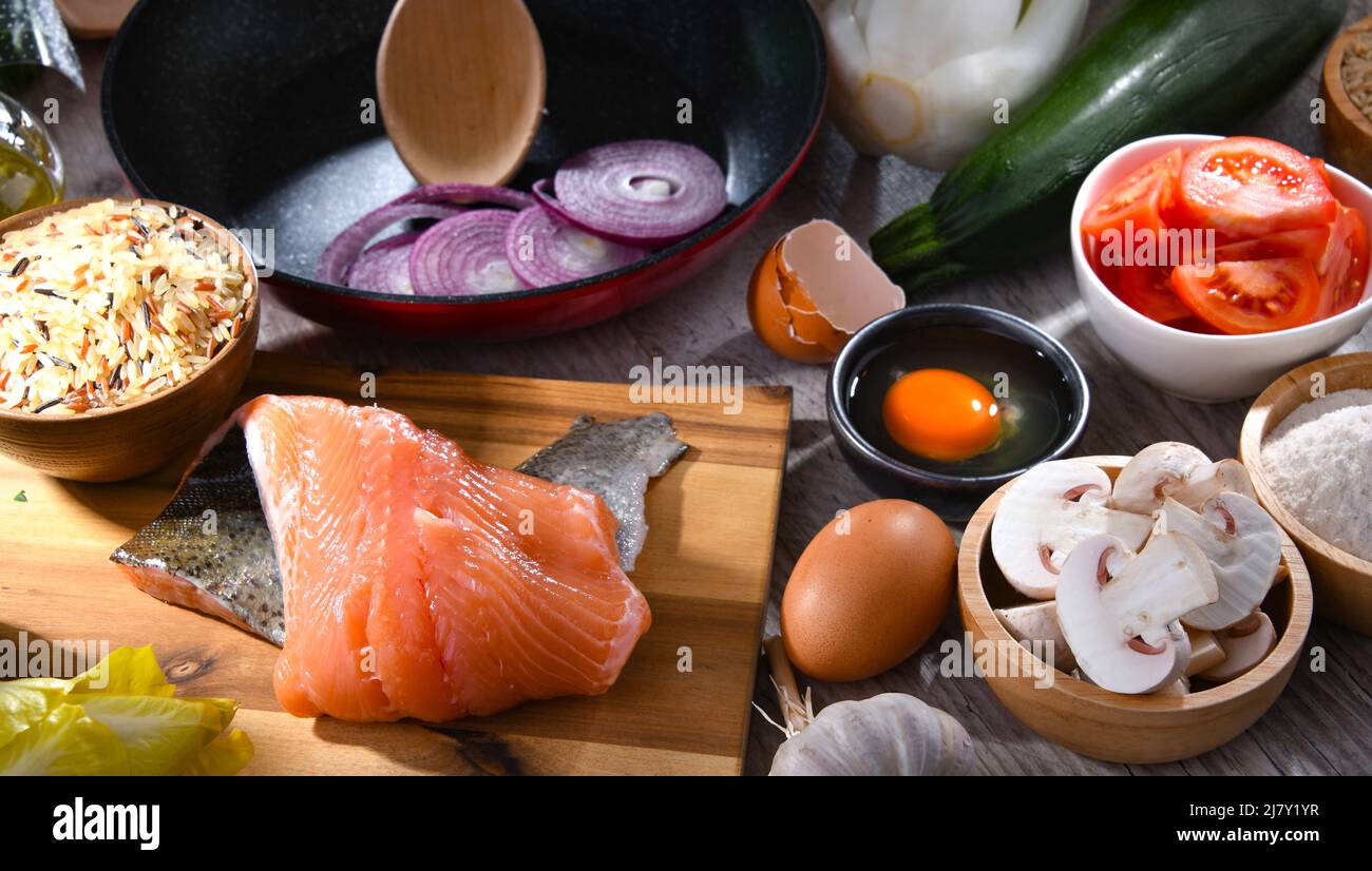 Fresh food ingredients prepared for cooking on a kitchen table Stock ...