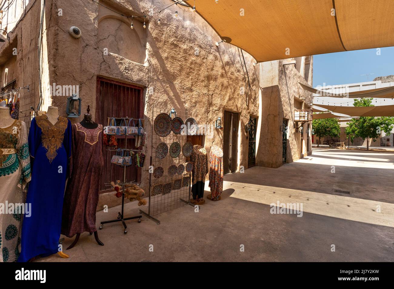 Market of traditional goods in old town Dubai, United Arab Emirates ...
