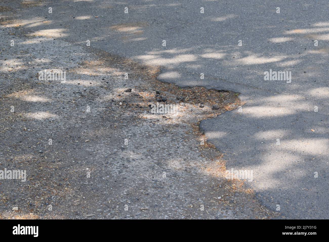 pothole in Germany Stock Photo - Alamy