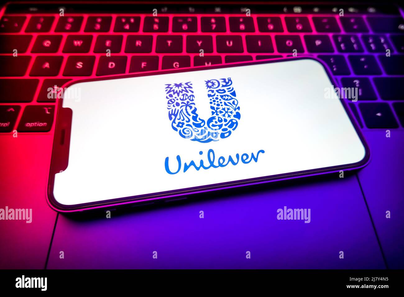 In this photo illustration, a Unilever logo is displayed on the screen ...