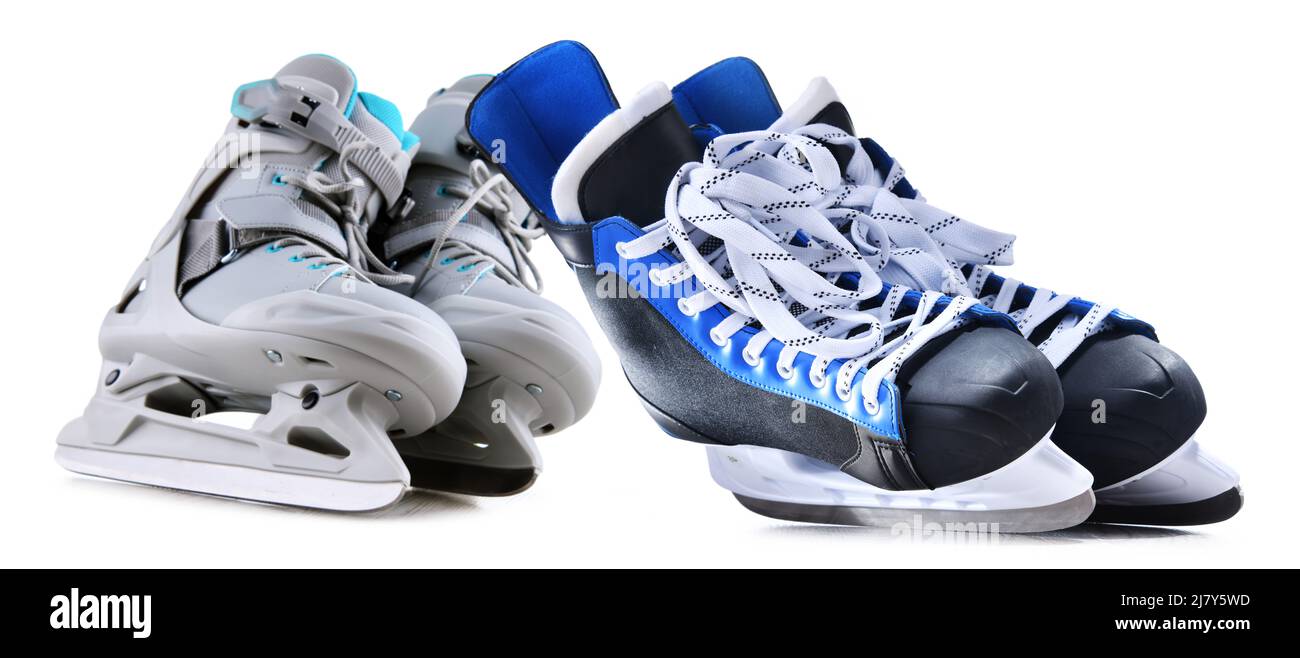 Two pairs of ice skates isolated on white background Stock Photo - Alamy